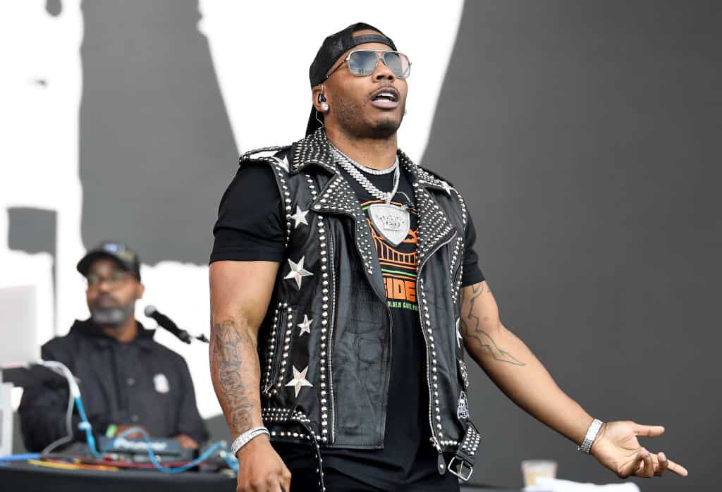 Nelly Aggressively Runs Into Crowd After Fan Throws Mysterious Object ...